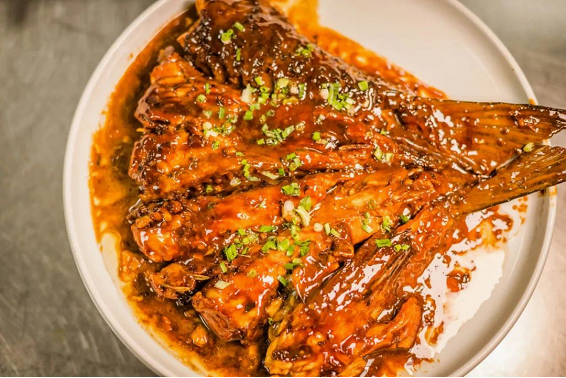 Qingyu Huashui Braised Black Carp Tails 英文版